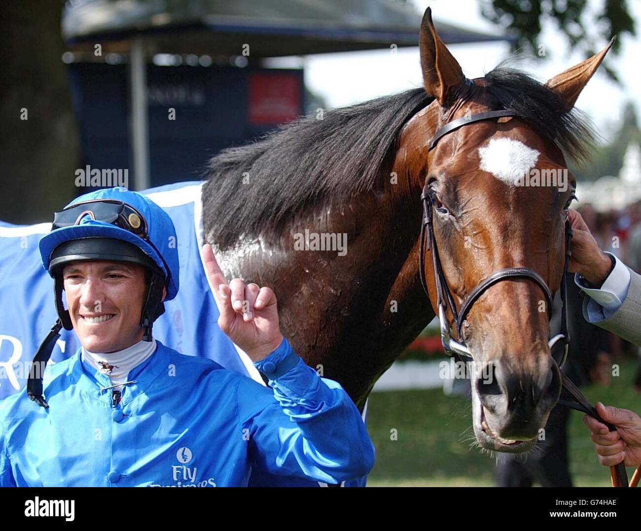 Jockey Frankie Dettori celebrates after riding Doyen to victory in The ...