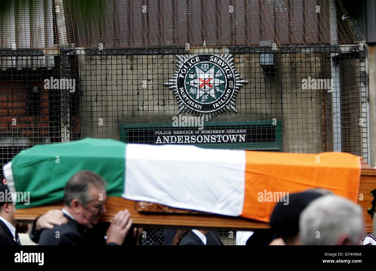 Locals watch as the coffin of veteran republican Joe Cahill passes ...