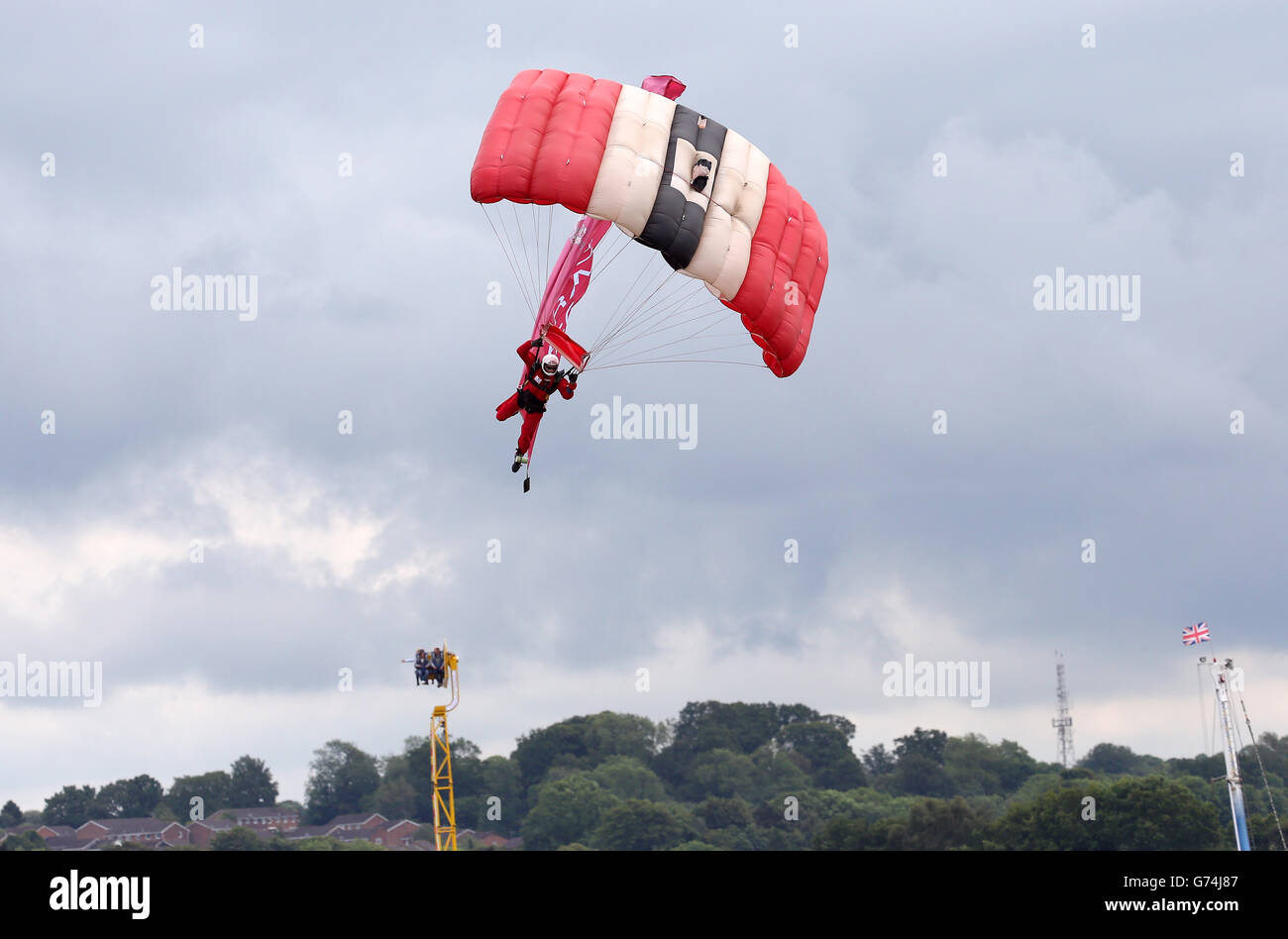 The Red Devils parachute team drop during Investec Derby Day 2014 at ...