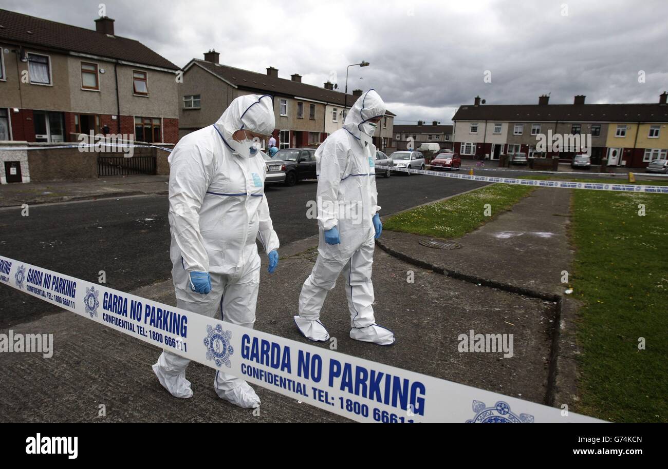 Members of the Garda forensic team at the crime scene in Croftwood ...