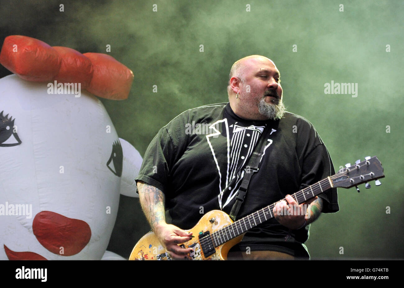 Chris Burney of Bowling For Soup performs in front of a giant blow up ...