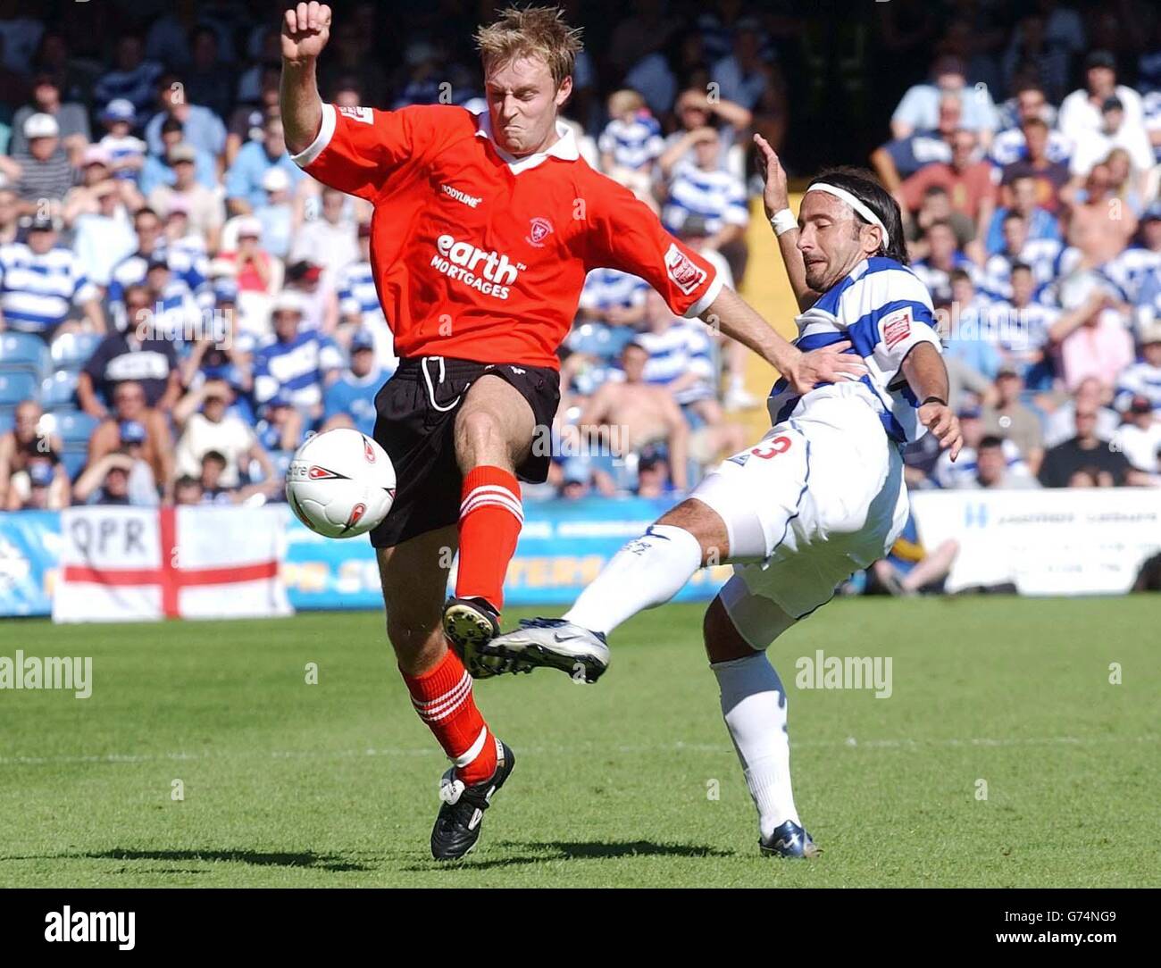 QPR's Gino Padula (right) challenges Rotherham United's Chris Sedgwick ...