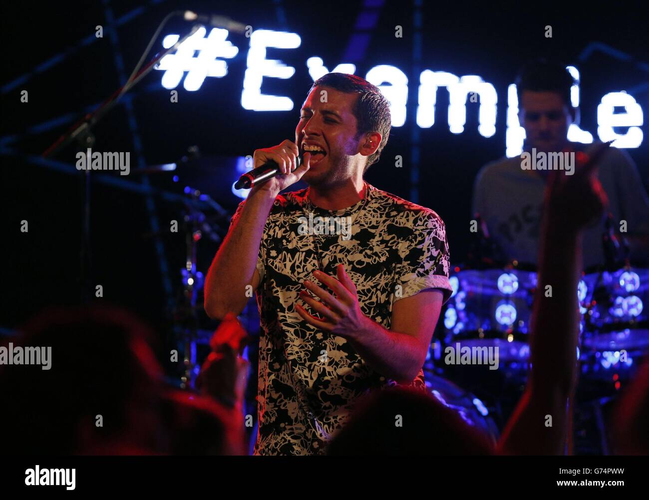 Example secret gig - London. Example performs during a secret gig for ...