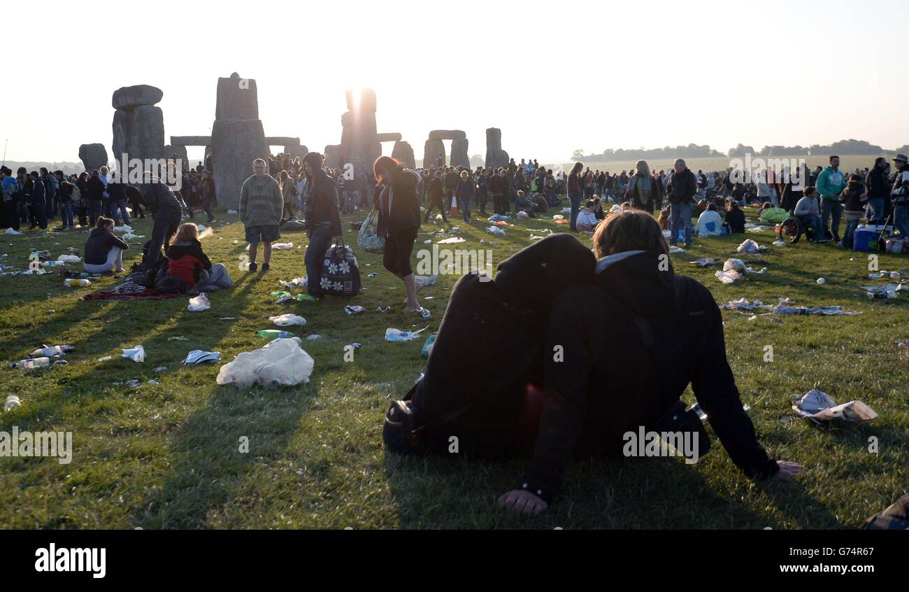 The sun rises above the horizon as dawn breaks behind the stones at ...
