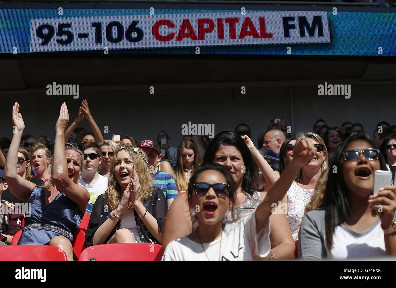 Fans in crowd capital fms summertime ball wembley stadium hi-res stock ...