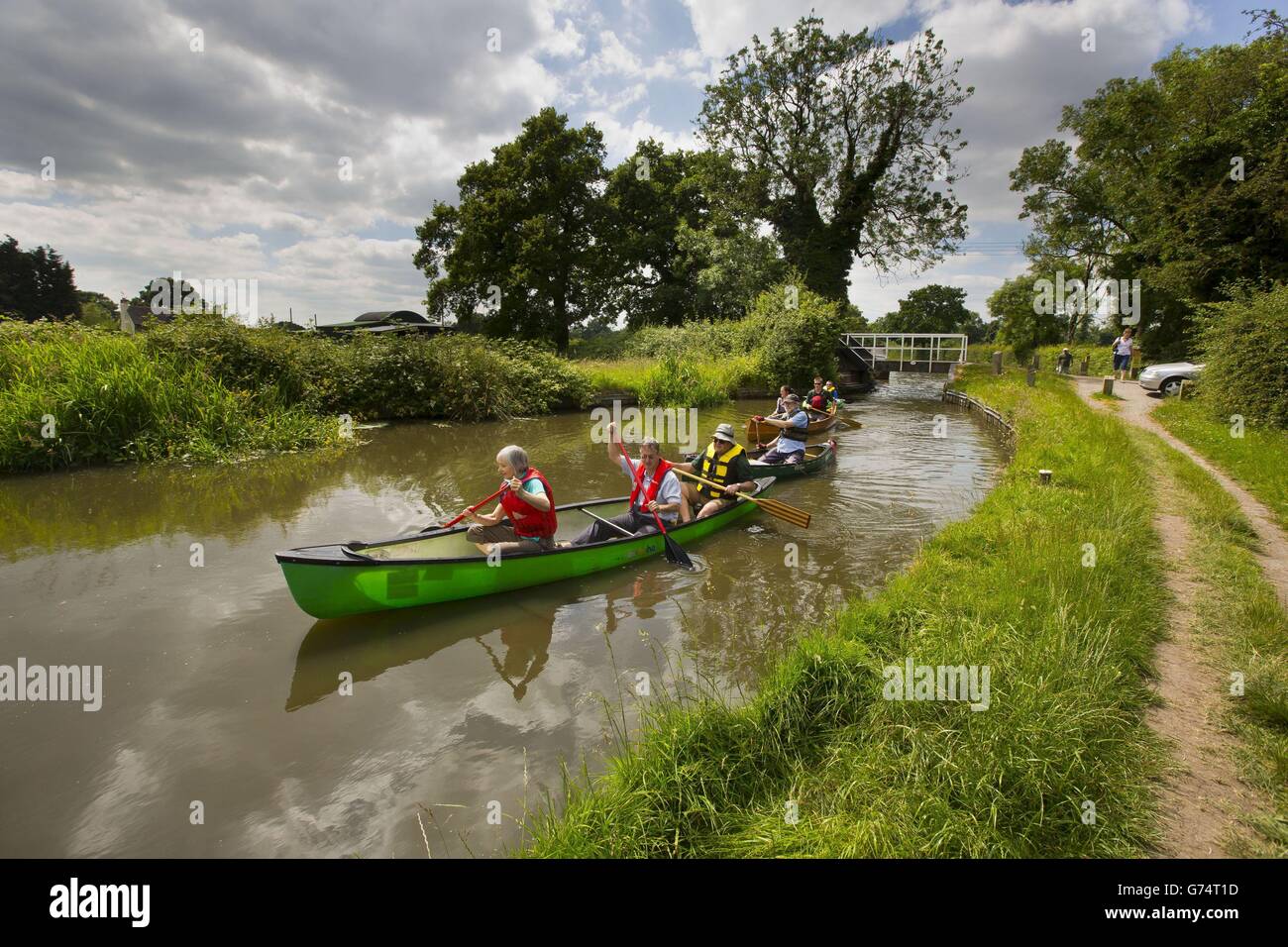 EDITORIAL USE ONLY Canoeists take part in an anniversary paddle along ...