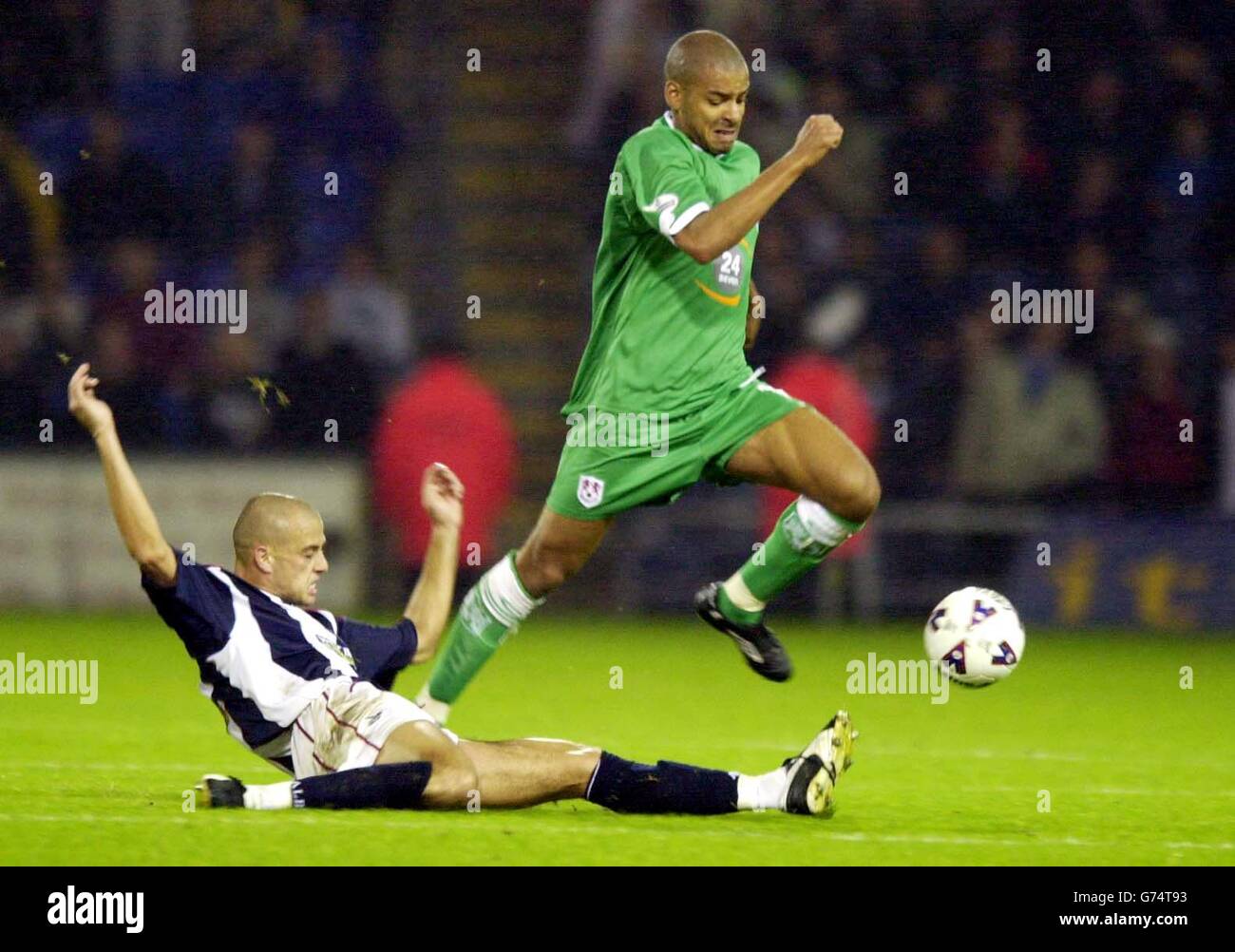 West Bromwich Albion's Neil Clement (left) challenges Millwall's Steven ...