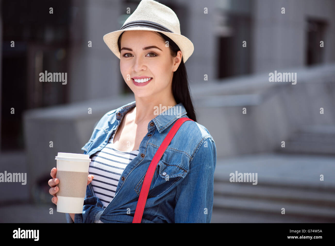 Positive beautiful woman having a walk Stock Photo - Alamy