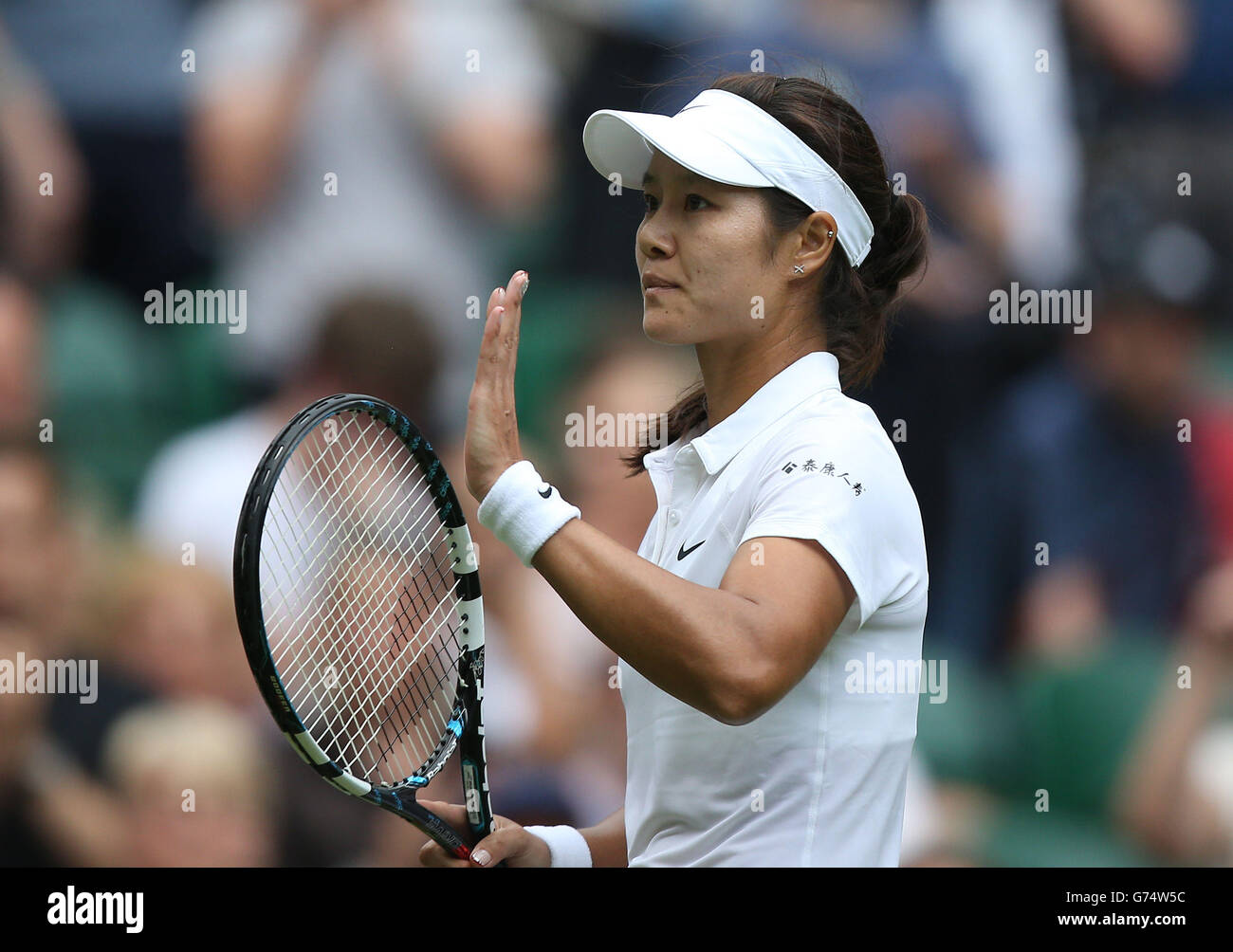 China's Na Li in action celebrates defeating Poland's Paula Kania ...