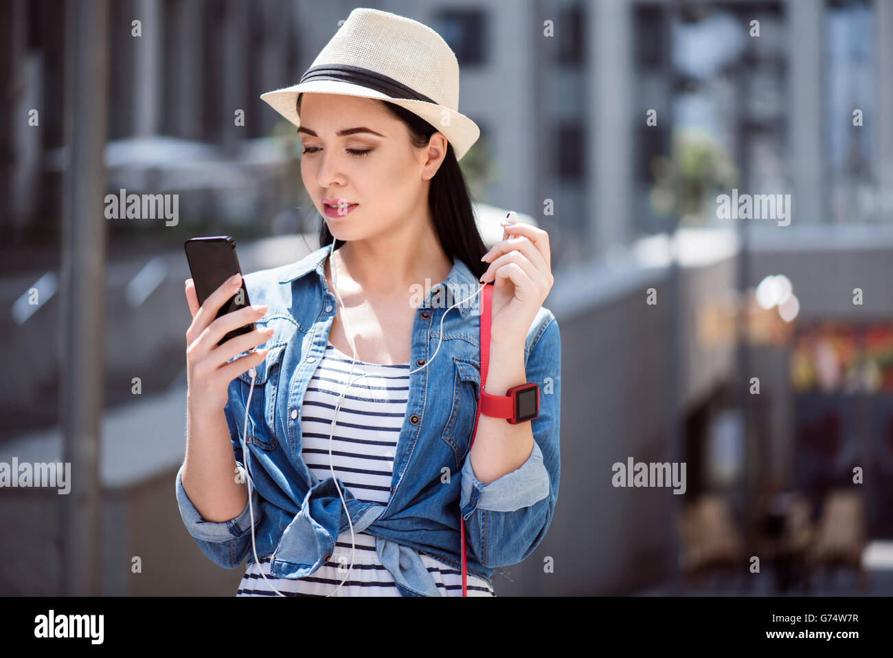 Beautiful woman holding cell hi-res stock photography and images - Alamy