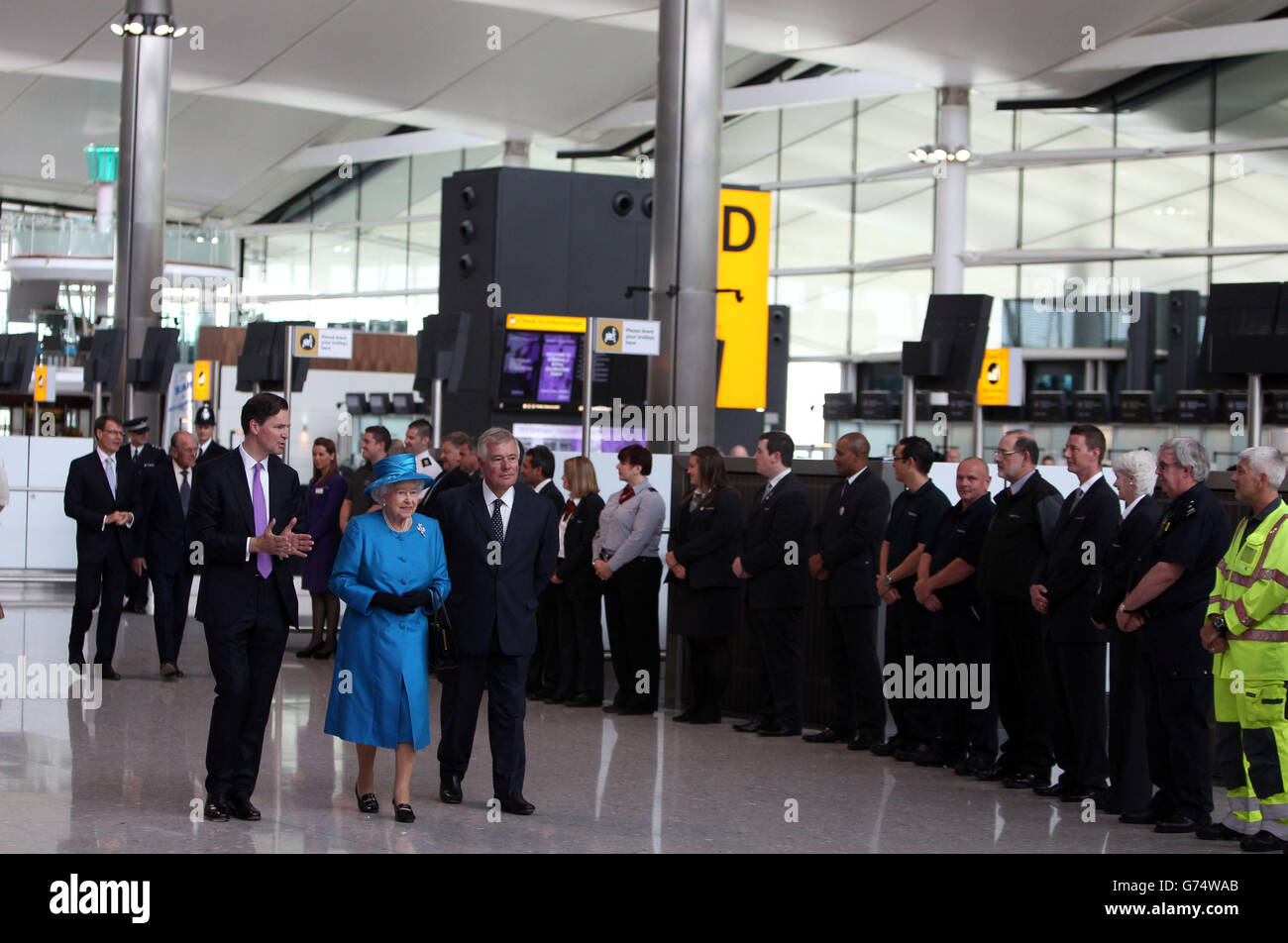 Queen Elizabeth II is shown around the new Terminal 2 The Queen's ...