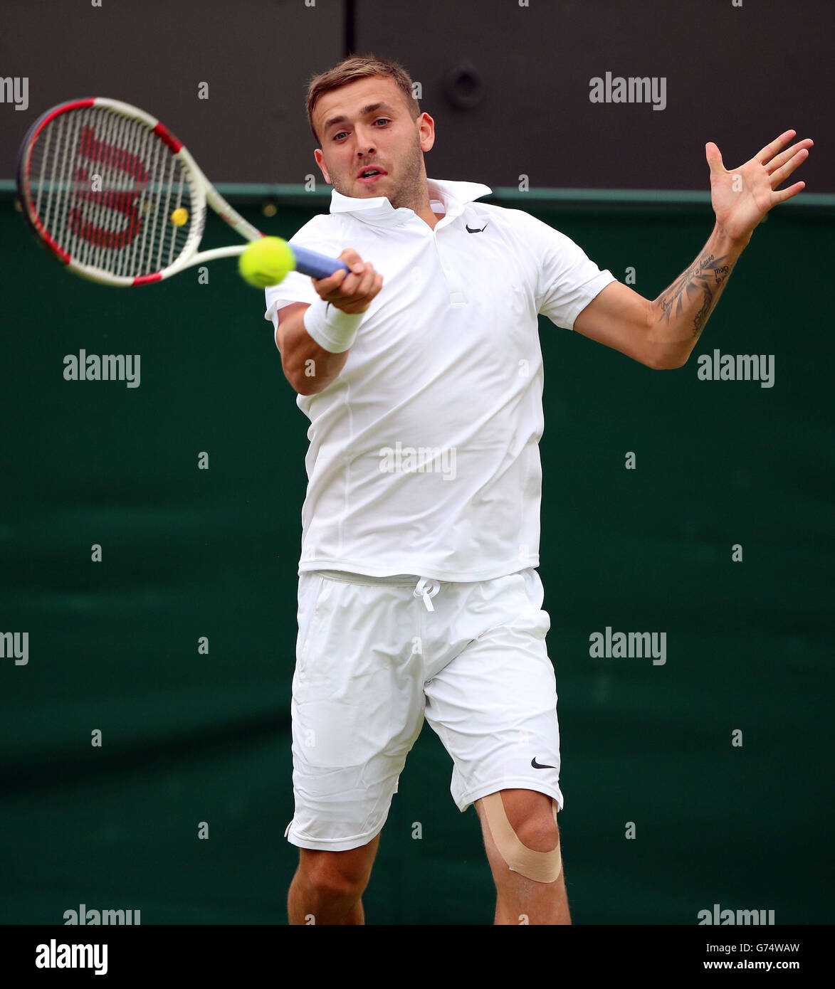 Great Britain's Daniel Evans in action against Russia's Andrey Kuznetsov during of day one of ...