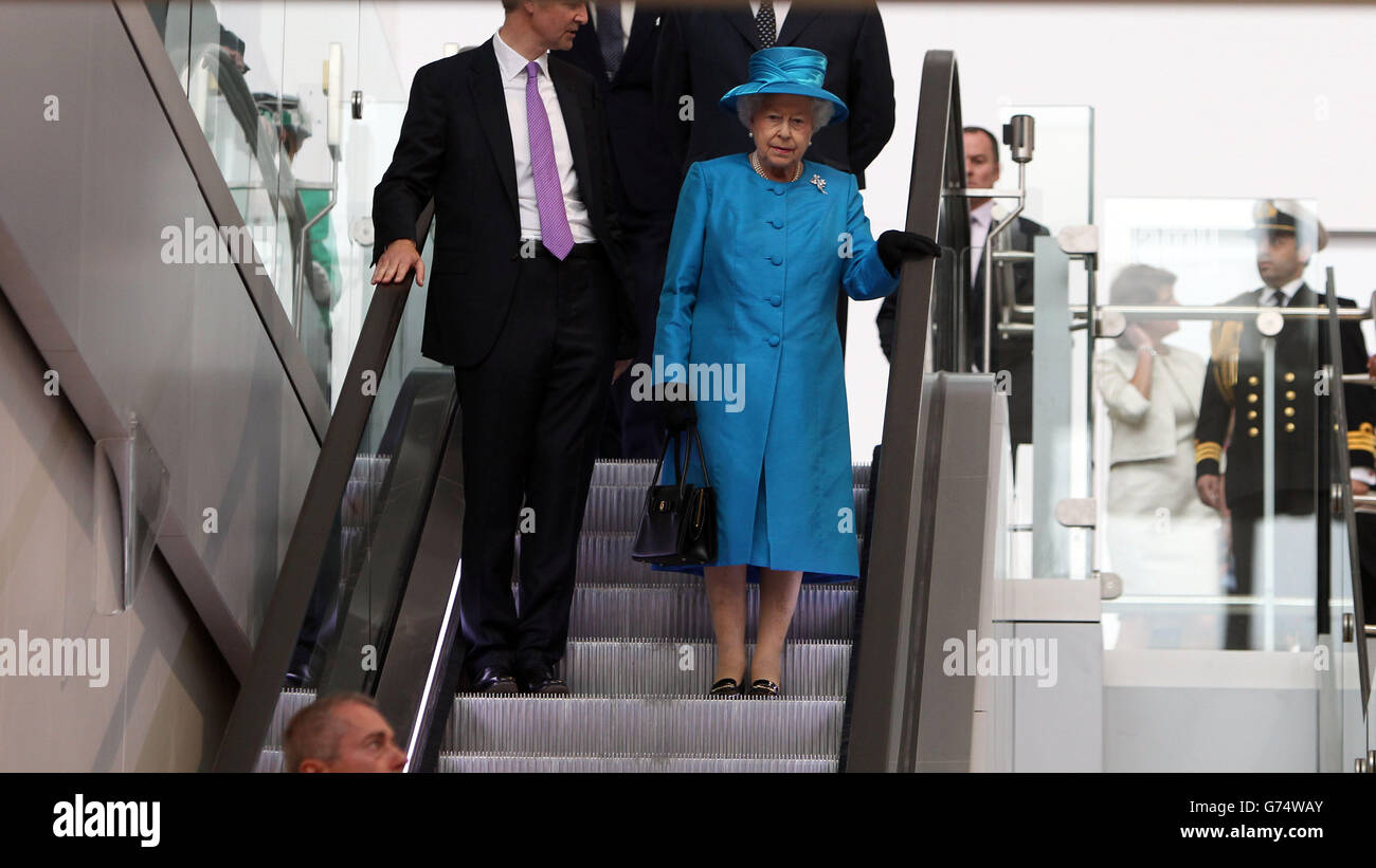 Queen Elizabeth II is shown around the new Terminal 2 The Queen's ...