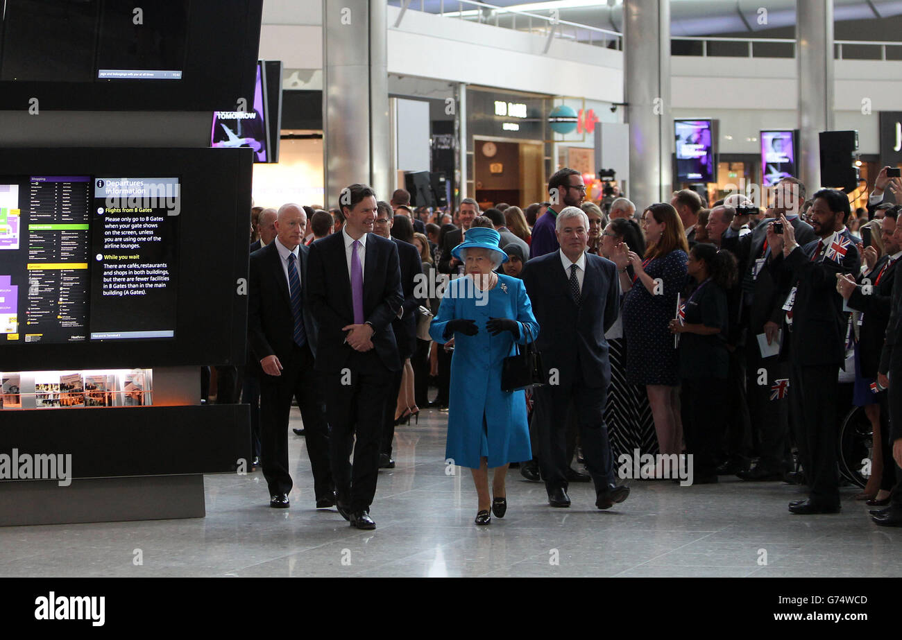 Queen Elizabeth II is shown around the new Terminal 2 The Queen's ...
