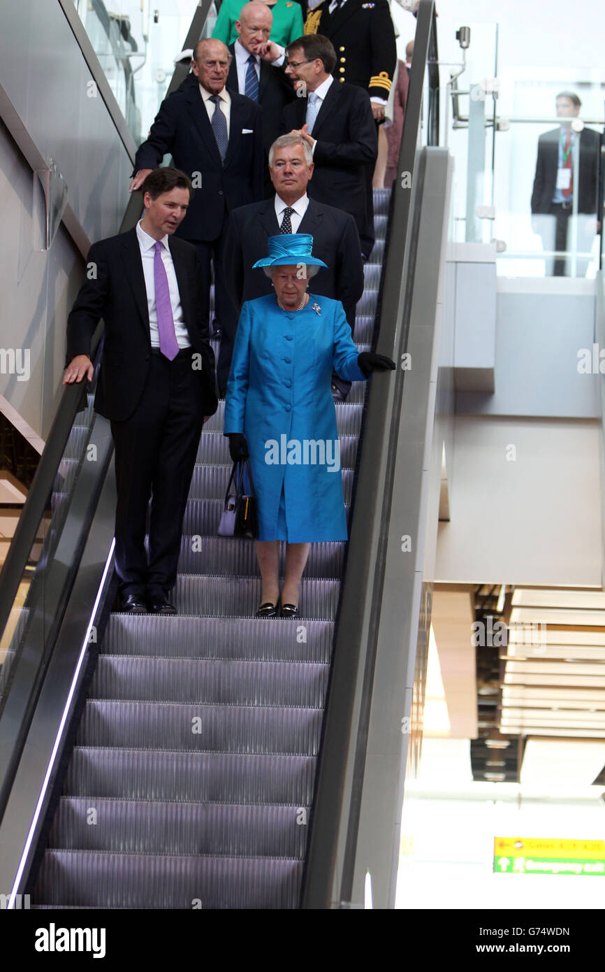 Queen Elizabeth II is shown around the new Terminal 2 The Queen's ...
