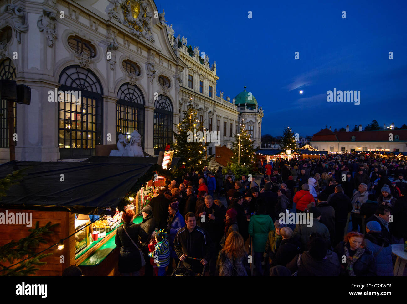 Advent and Christmas Market in front of Belvedere Palace with full moon ...