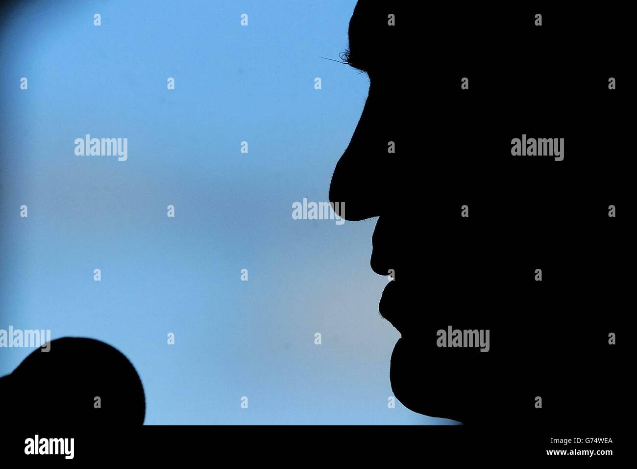 Wales' coach Graham Henry faces the mike during a press conference at ...