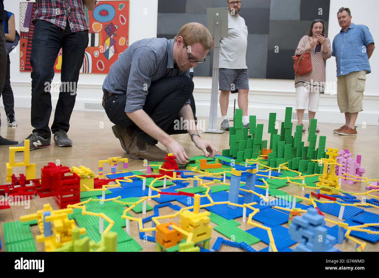 A member of the Stanton Williams team works on their design in the UK's ...