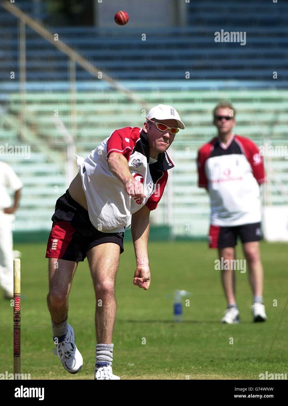 Sport cricket action arm extended throwing bombay hi-res stock ...