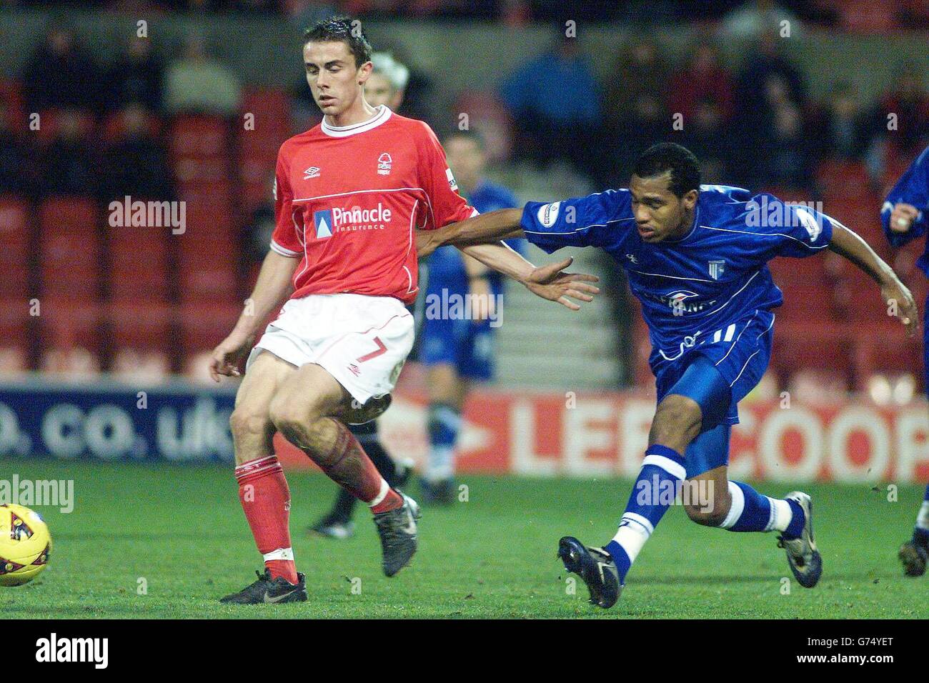 Kevin James for Gillingham (right) with David Prutton for Nottingham ...