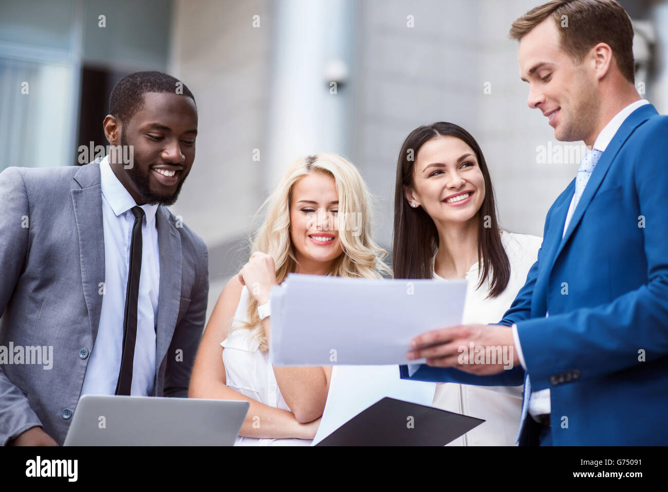 Colleagues smile hi-res stock photography and images - Alamy