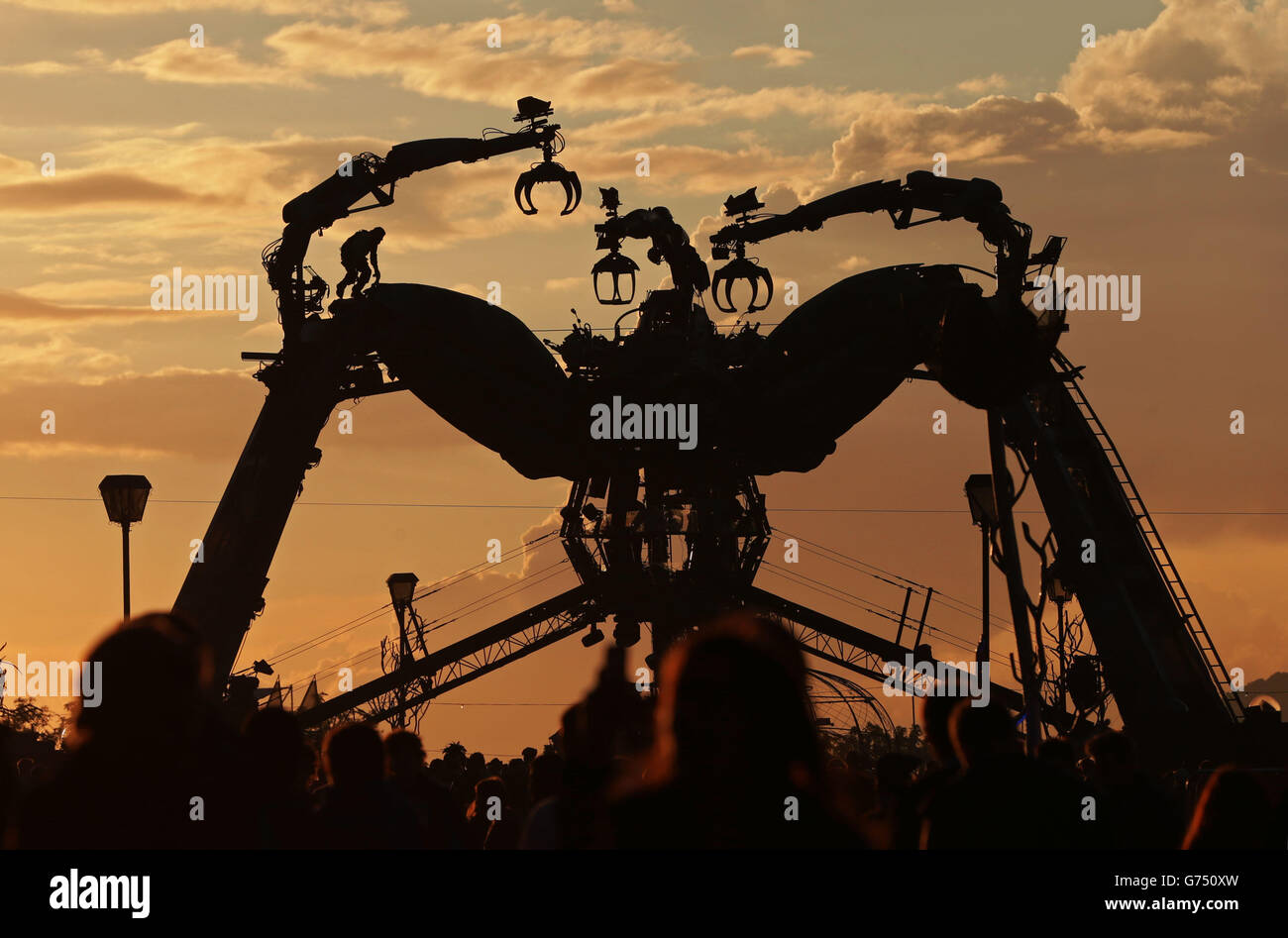 The giant mechanical spider at Arcadia is silhouette at sunset at the ...