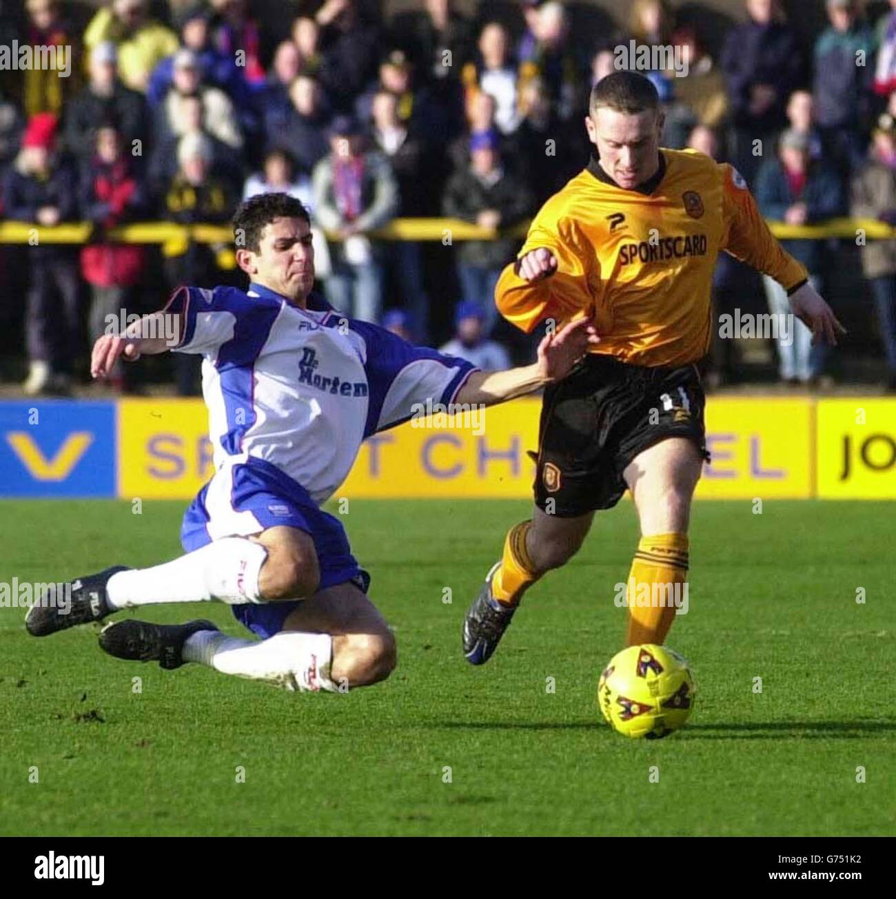 Hull City's David Beresford (R) and Rushden and Diamonds' Tarkan ...