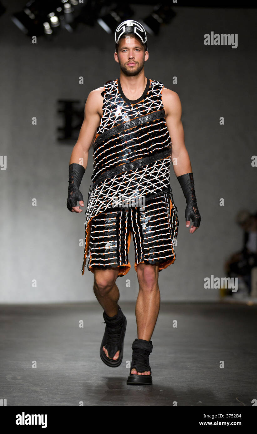A model on the catwalk during the KTZ show at the British Fashion ...