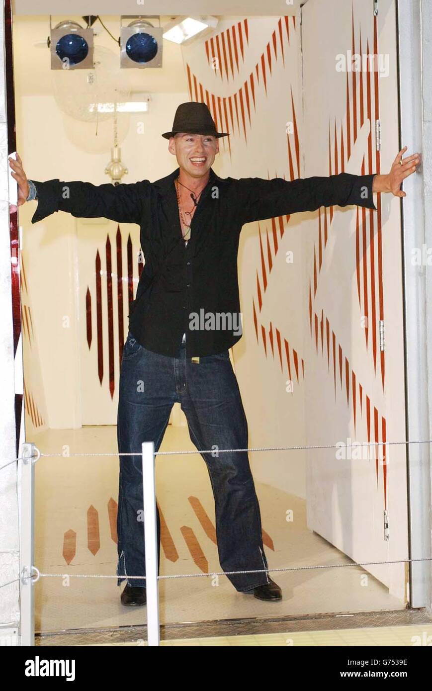 Dan Bryan poses for photographers, after leaving the house as third ...