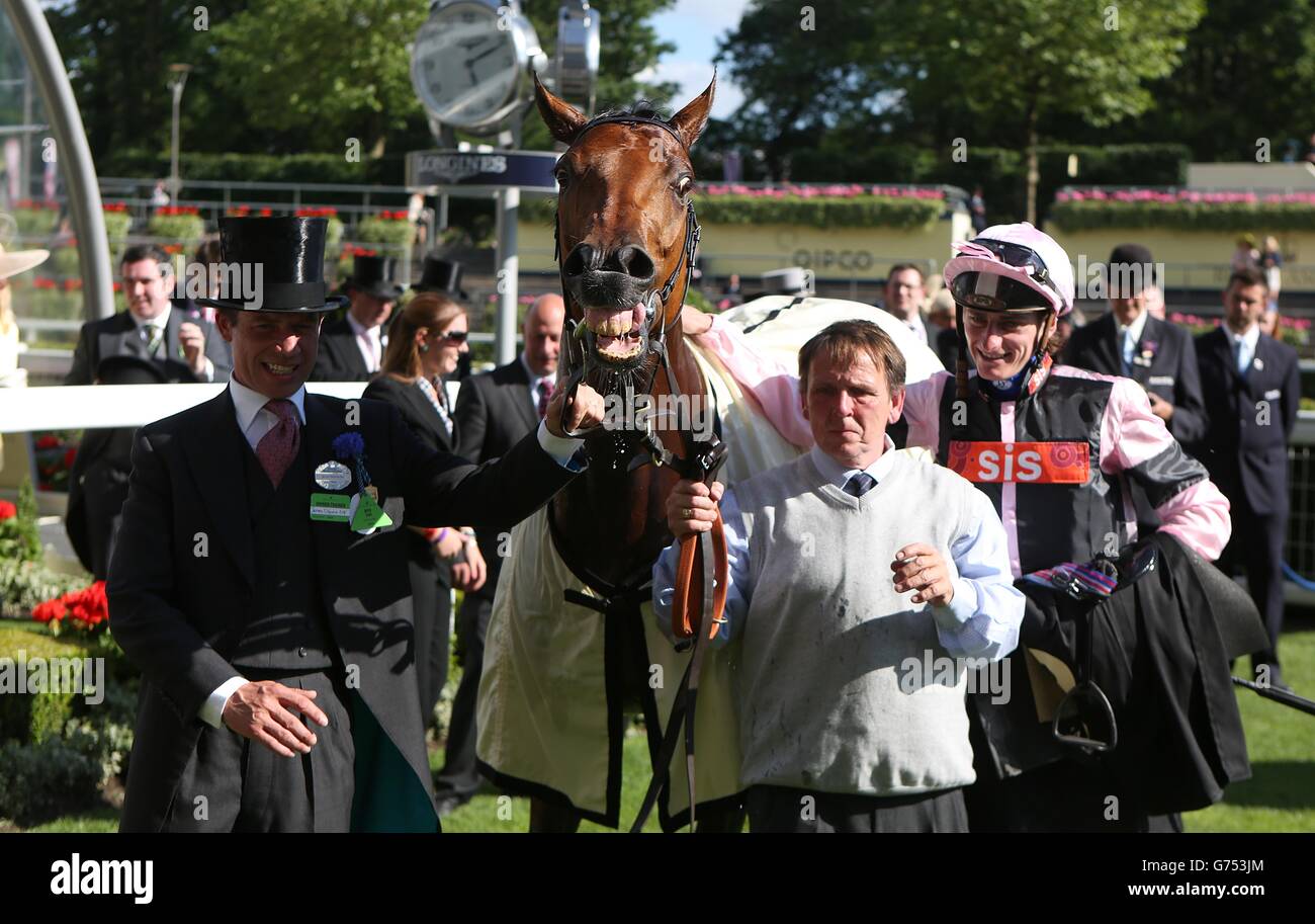 Trainer Jamie Osborne (left) and jockey Adam Kirby (right) celebrate ...