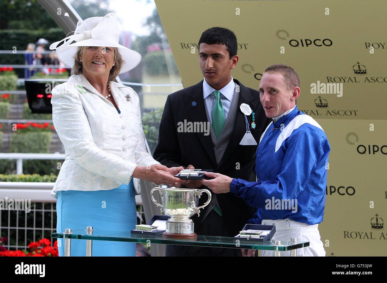 Jockey Paul Hanagan (right) celebrates winning the Sandringham Handicap ...
