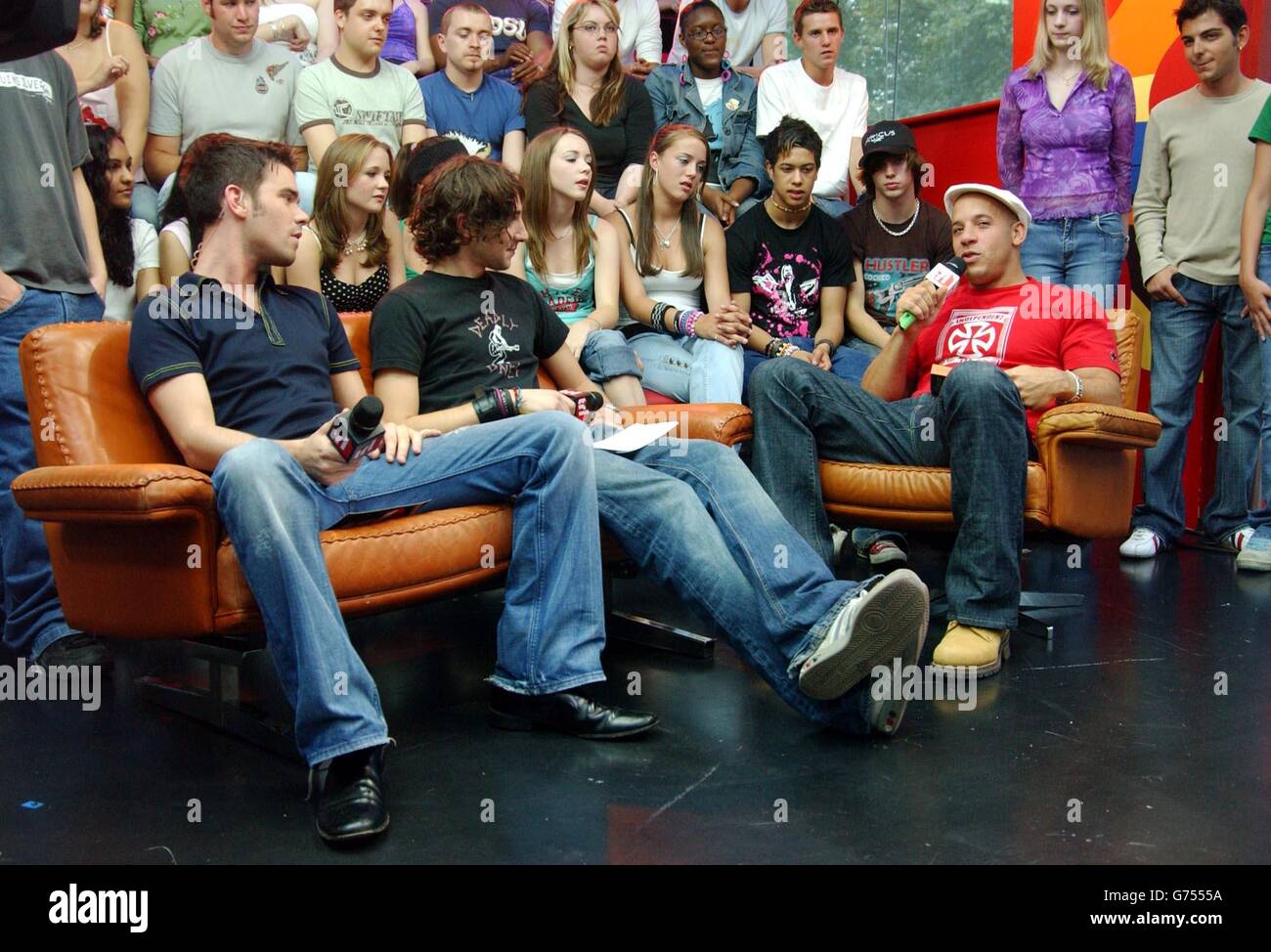 (From left to right) MTV presenters Dave Berry and Alex Zane with US ...