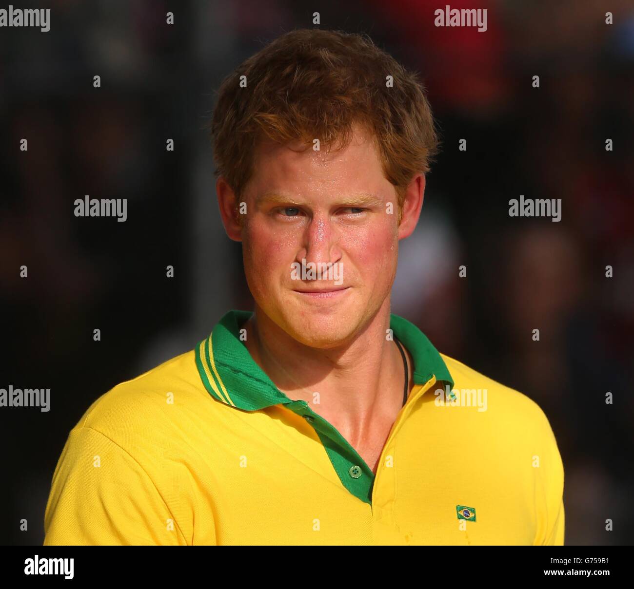 Prince Harry plays football with children at the Acer Community project ...