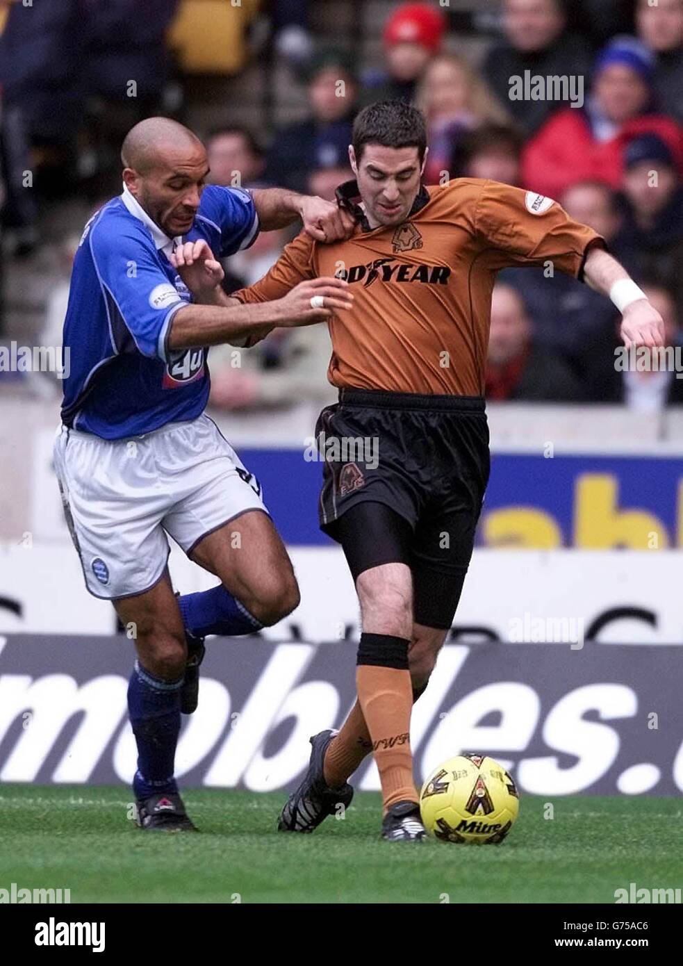 Wolves winger mark kennedy tussles with birmingham citys curtis fleming ...