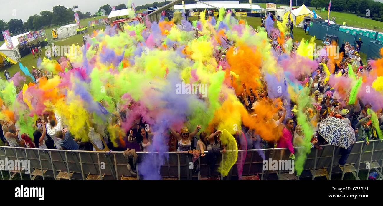 People throw paint - rice flour coloured with water soluble food ...