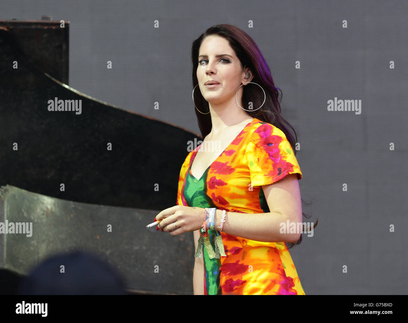 Lana del Rey smoking a cigarette whilst on the Pyramid Stage at the ...