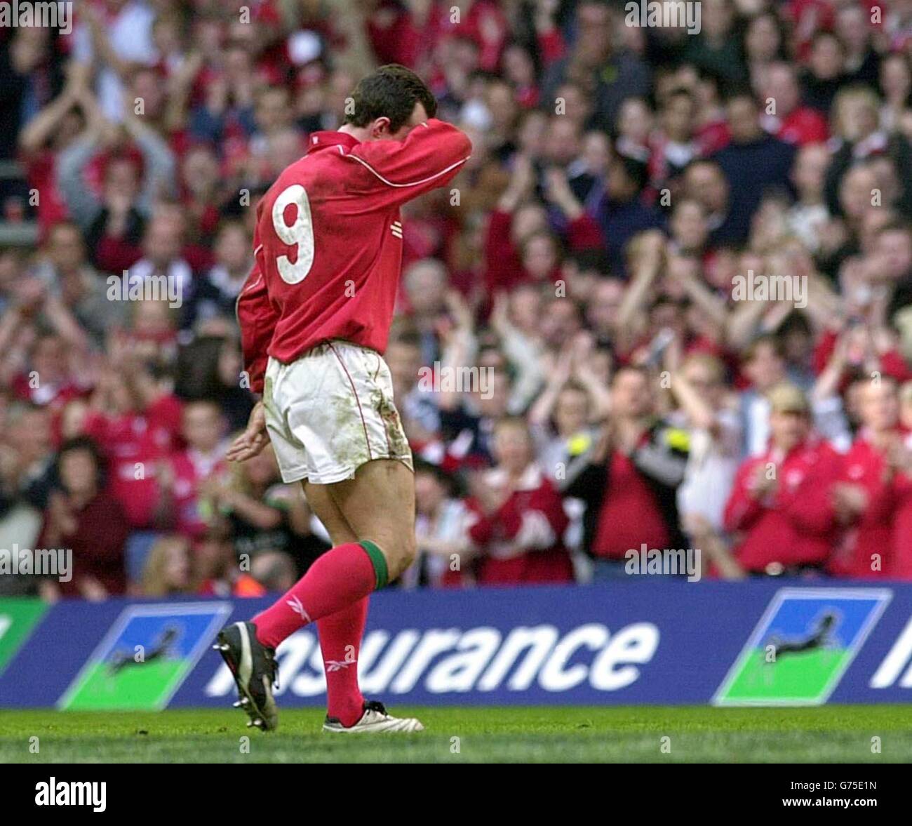 Welsh scrum half Rob Howley leaves the field as an international player ...