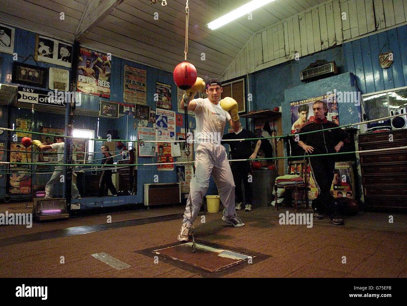 Boxer Joe Calzaghe with his father and trainer Enzo (right), during a ...