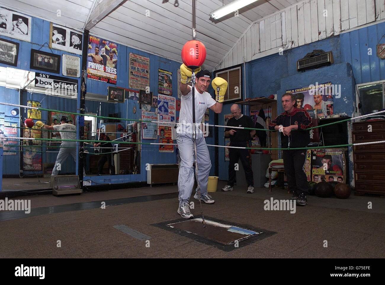 Boxer Joe Calzaghe with his father and trainer Enzo looking on from the ...