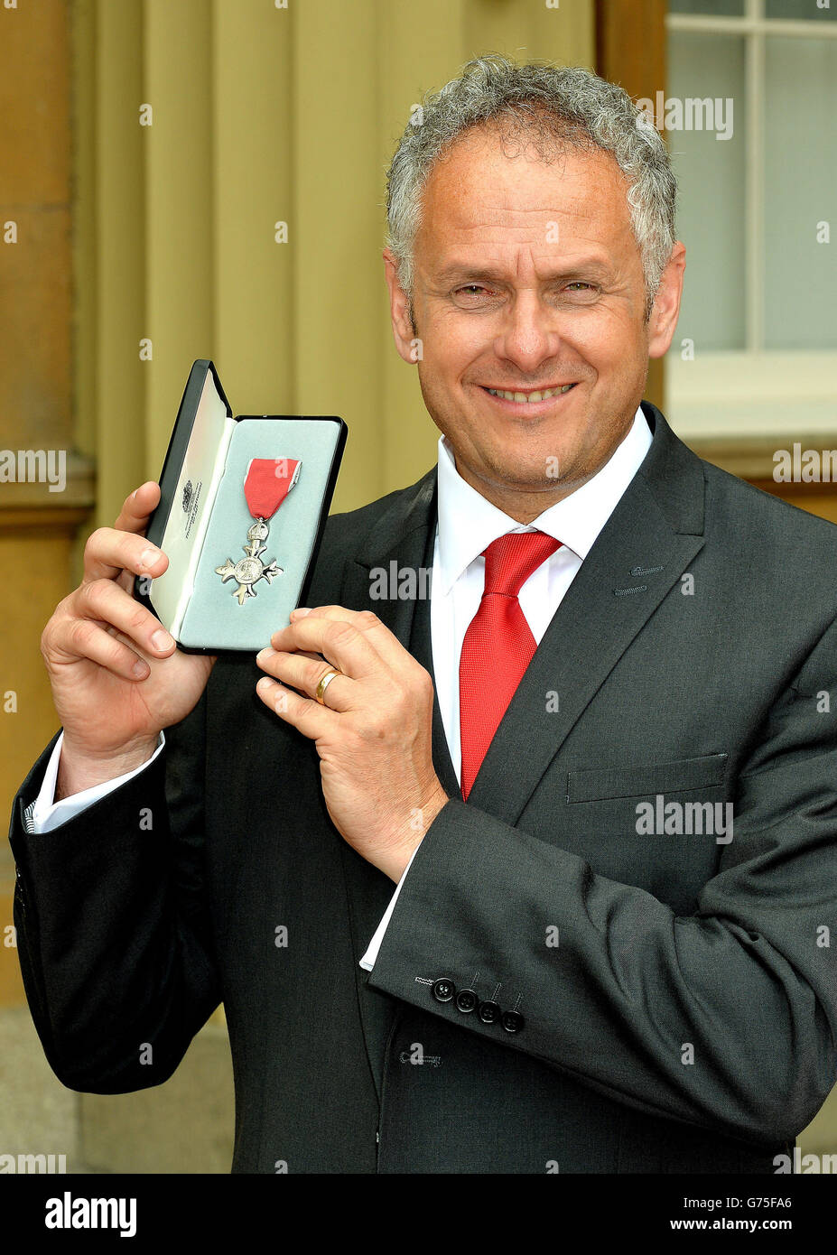 Proudly holds his mbe member of the british empire hi-res stock ...