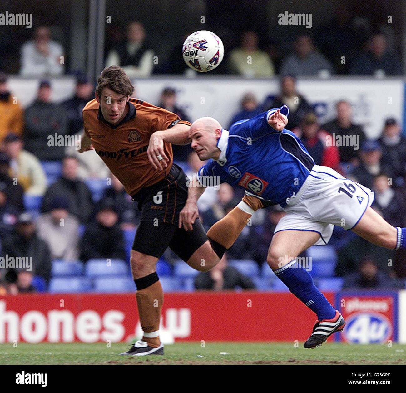 Wolverhampton Wanderers' Paul Butler (L) scores heads the ball to score ...