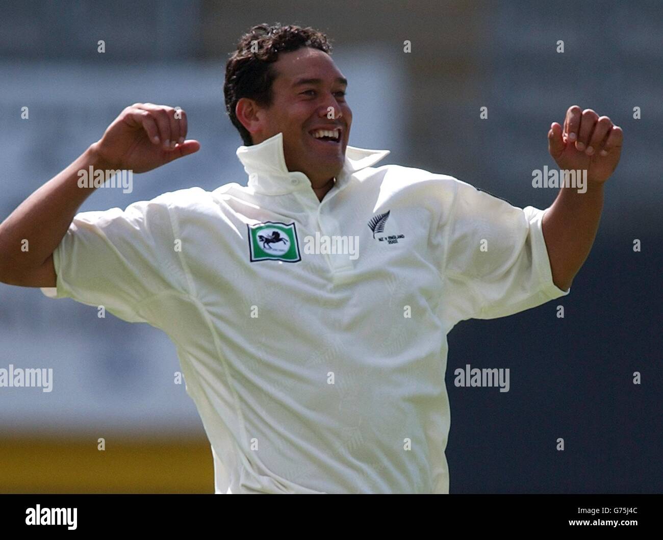 New Zealand's Daryl Tuffey celebrates taking the wicket of England's ...