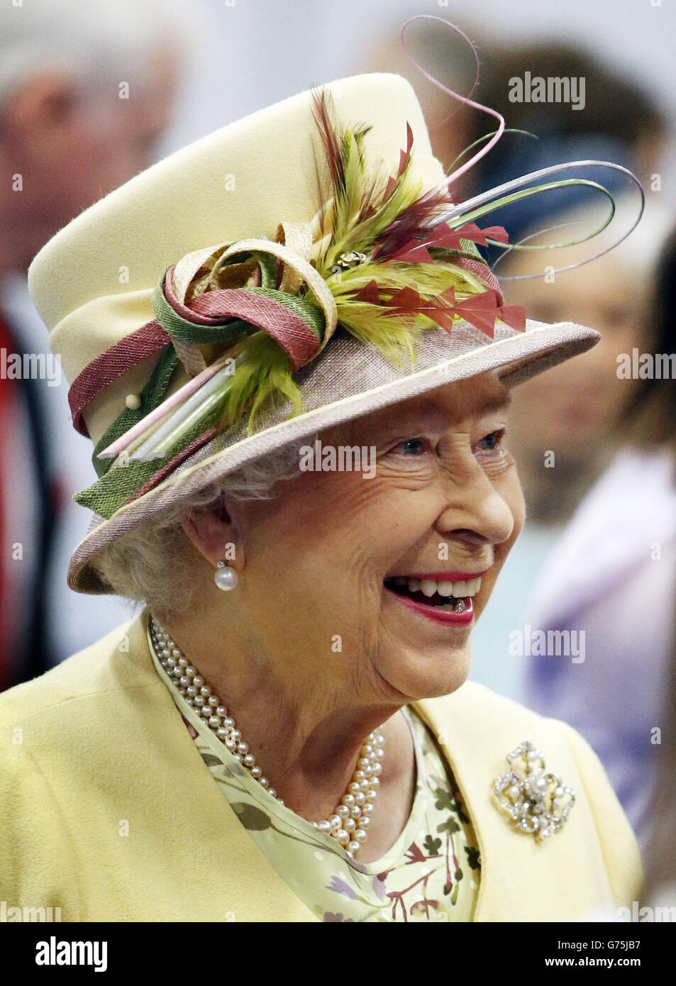 Queen Elizabeth II during a visit to the Commonwealth Games Uniform and ...