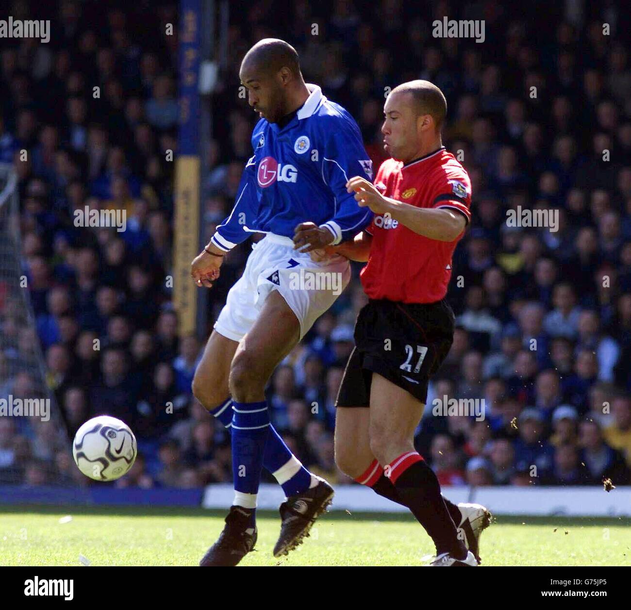 Leicester City's Brian Deane shields the ball away from Manchester ...