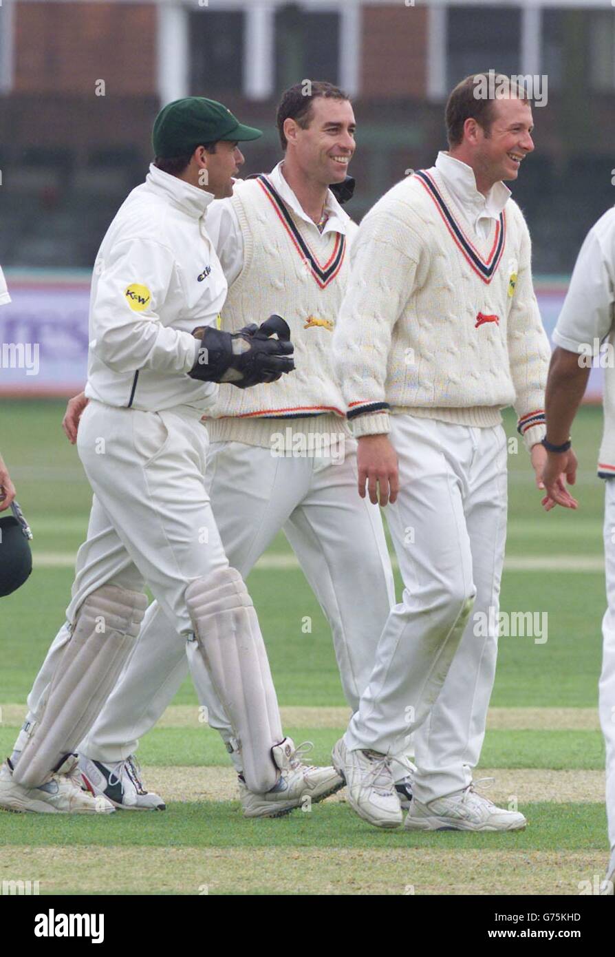 Leicestershire's Michael Bevan (centre) celebrates taking his 2nd ...