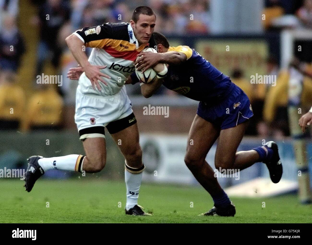 Leeds's Mark Calderwood (right) tackles Bradford's Lee Gilmour during ...