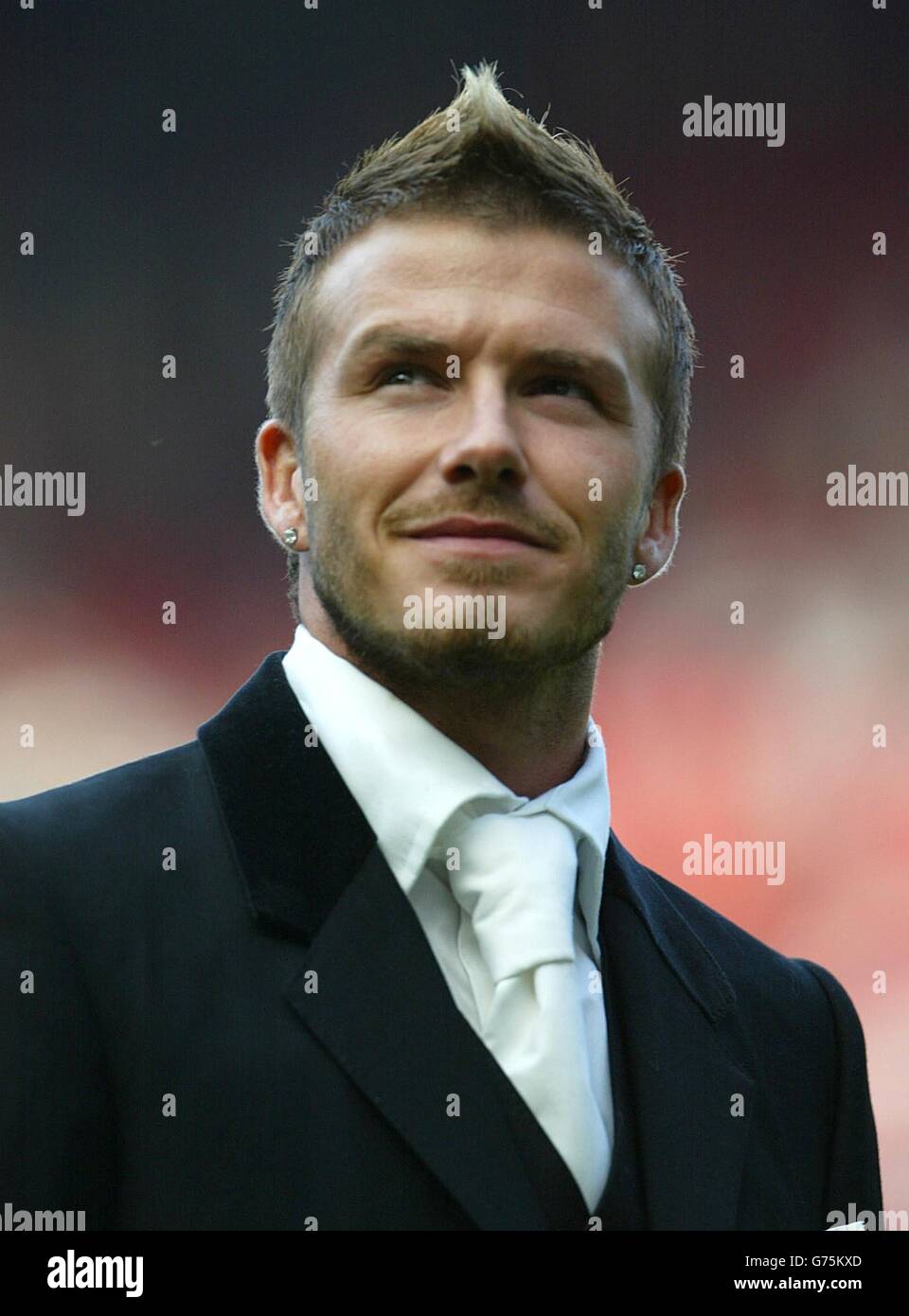 Manchester United's David Beckham claps the fans after his teams last ...