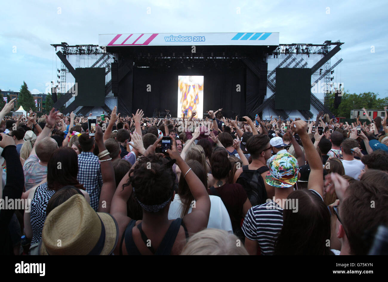 The crowd watching Kanye West performing on the Main Stage at the ...