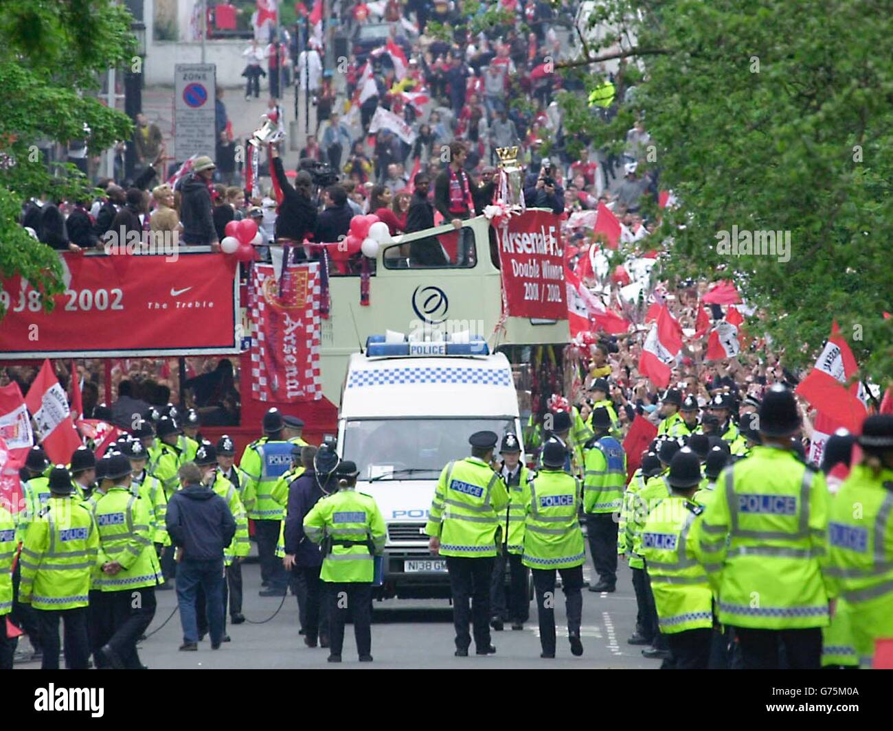 The Arsenal team bus leaves the Highbury stadium, north London, and ...