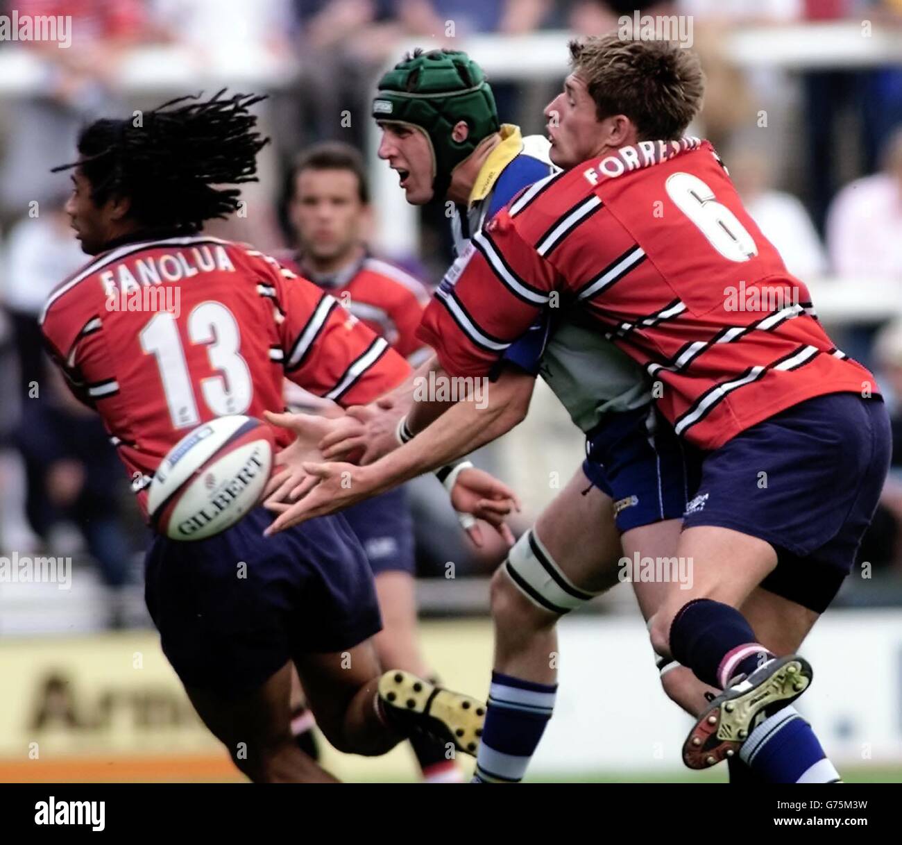 Leeds's Phil Murphy (with helmet) is caught by Gloucester's James ...